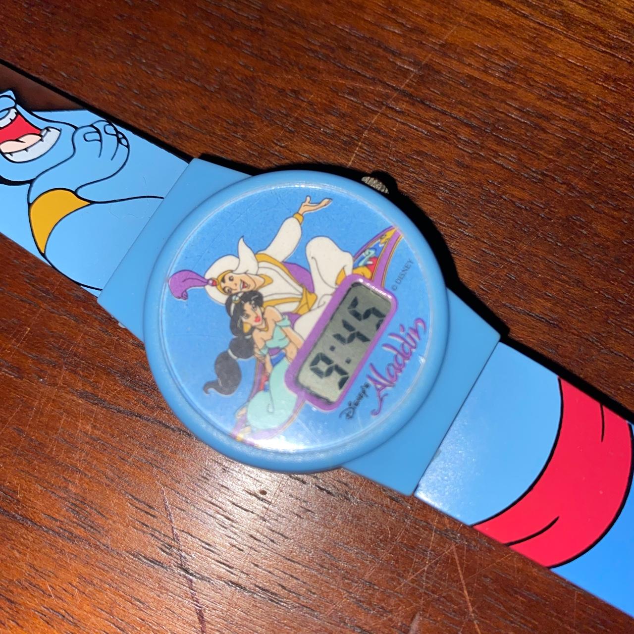 Disney’s aladdin light blue vintage 90’s digital... - Depop
