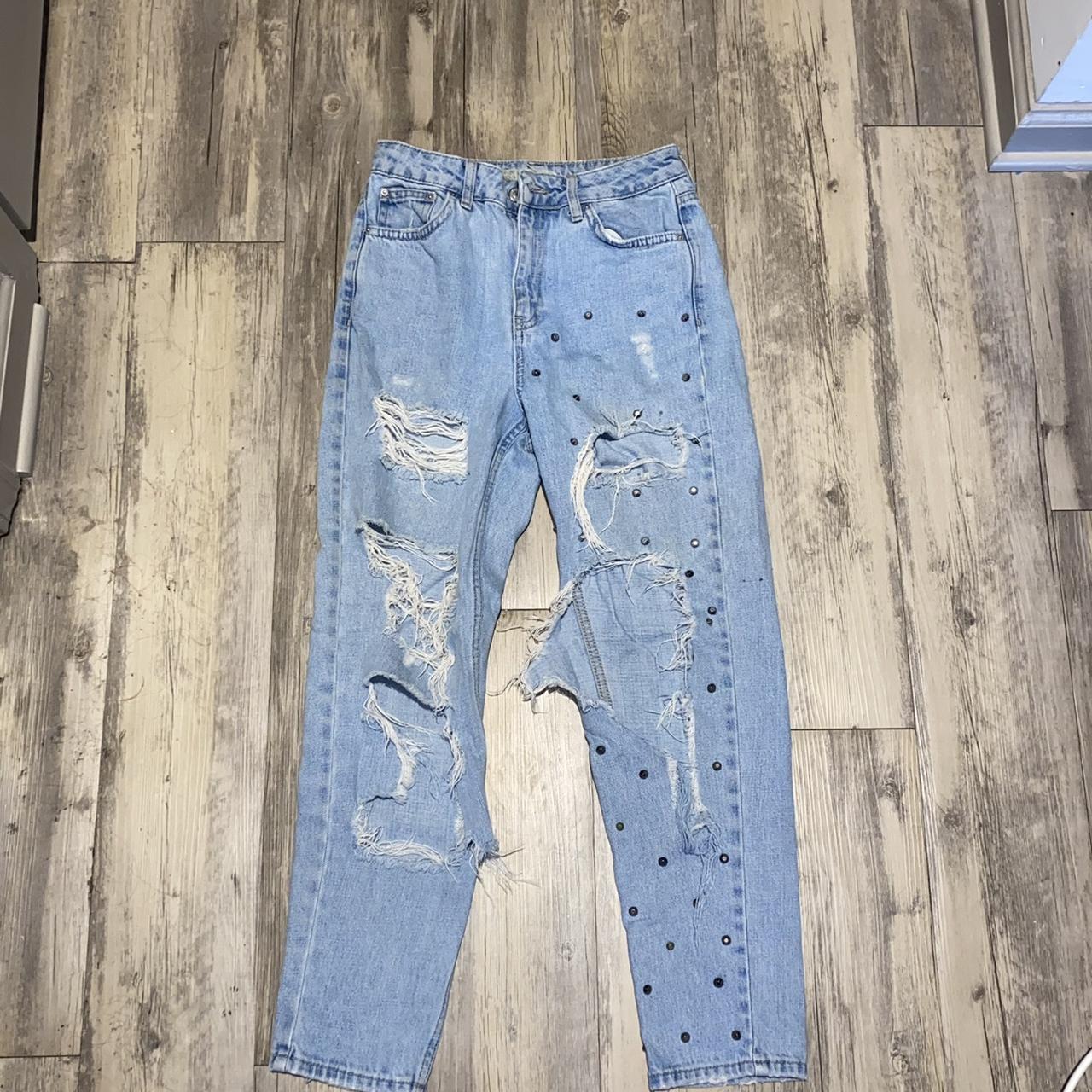 Fitted ripped mom jeans with rhinestones on one leg.... - Depop
