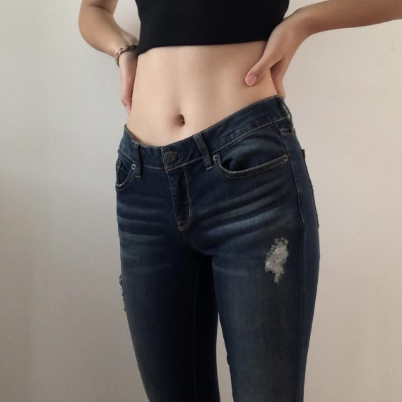 Size 0 stretchy dark wash ripped jeans with no... - Depop