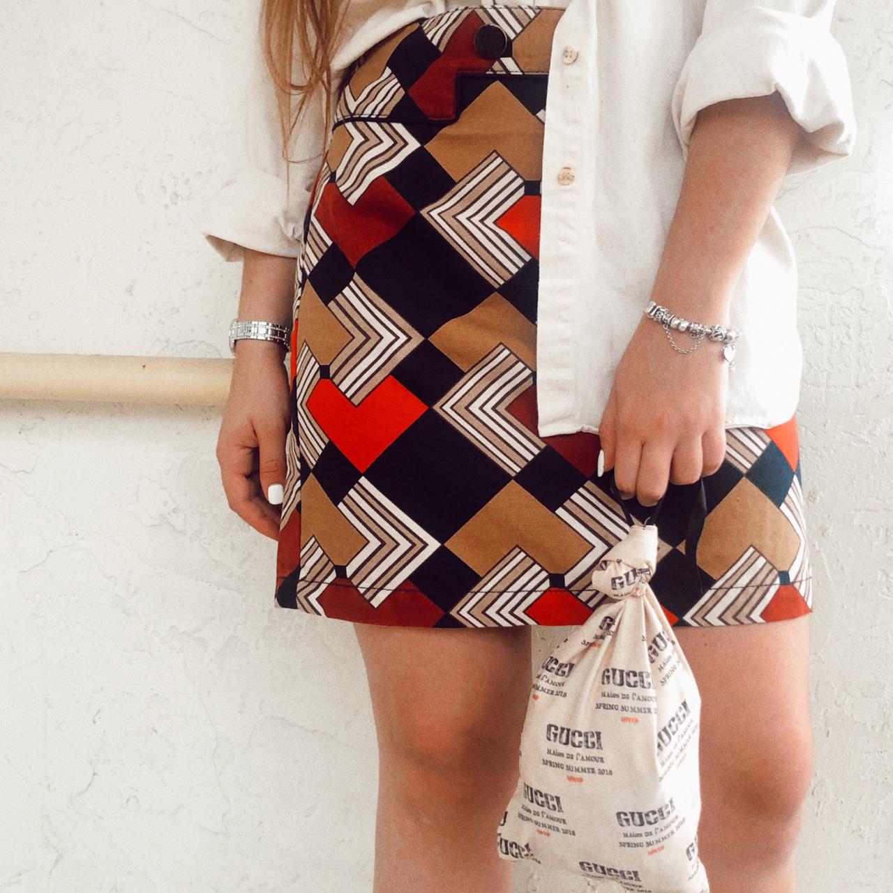 Mod skirt with button details and heart abstract... - Depop