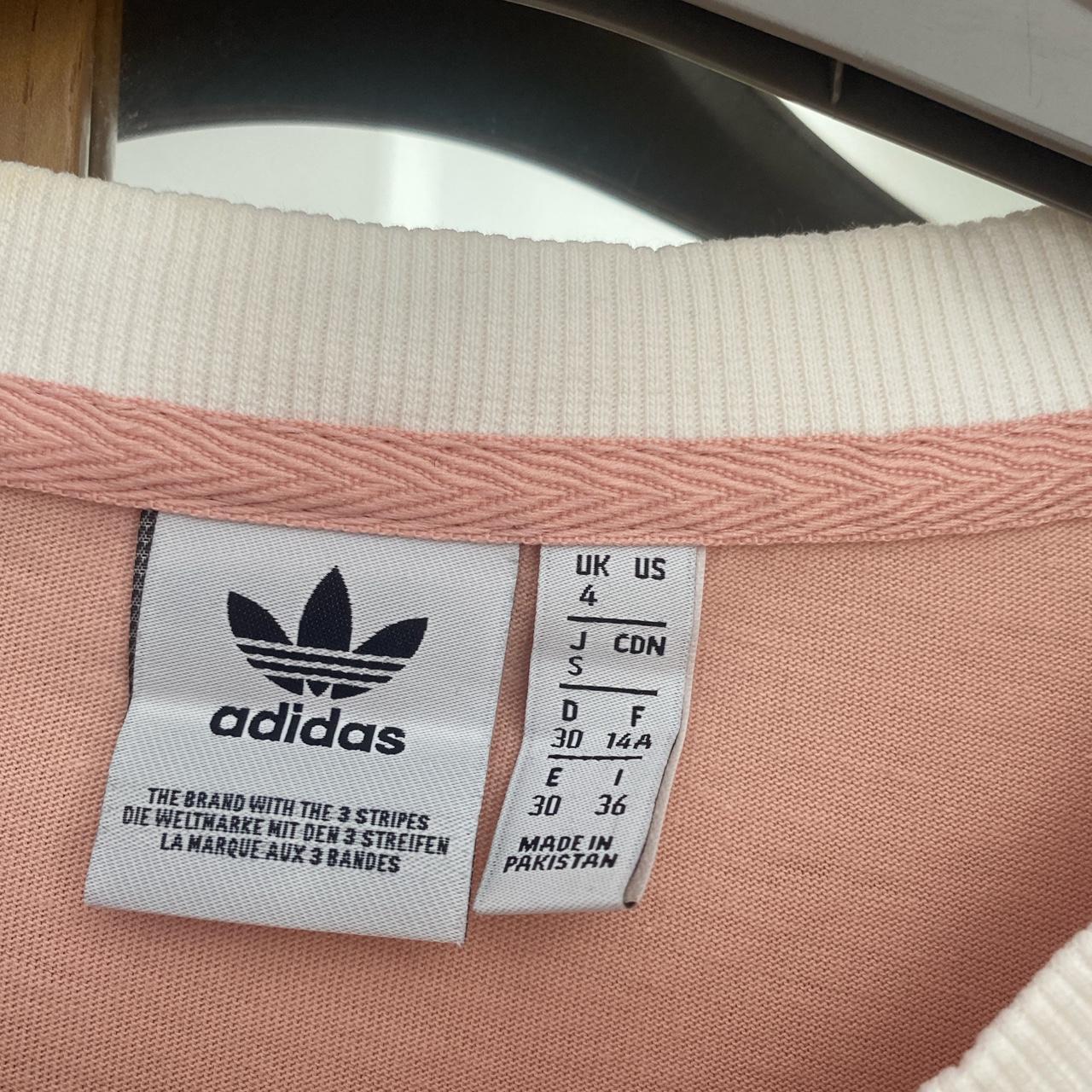 Pink and white adidas top. So comfy and worn a few... - Depop