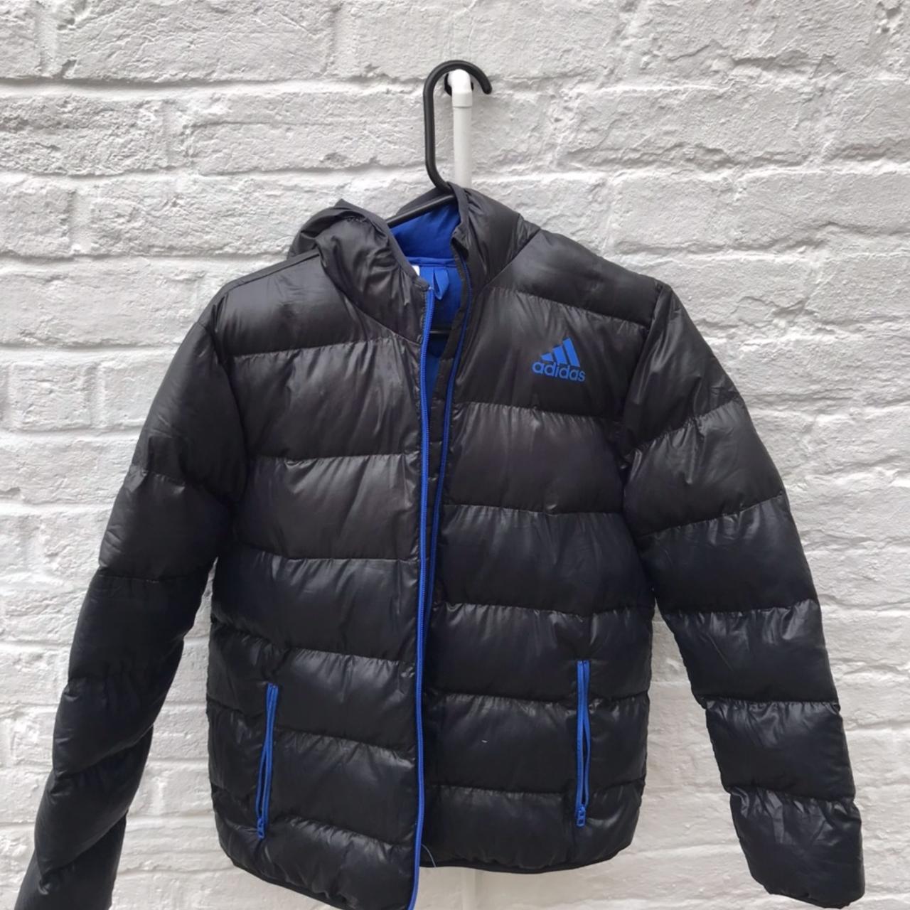 Black Adidas jacket with blue logo and inside. Age... - Depop