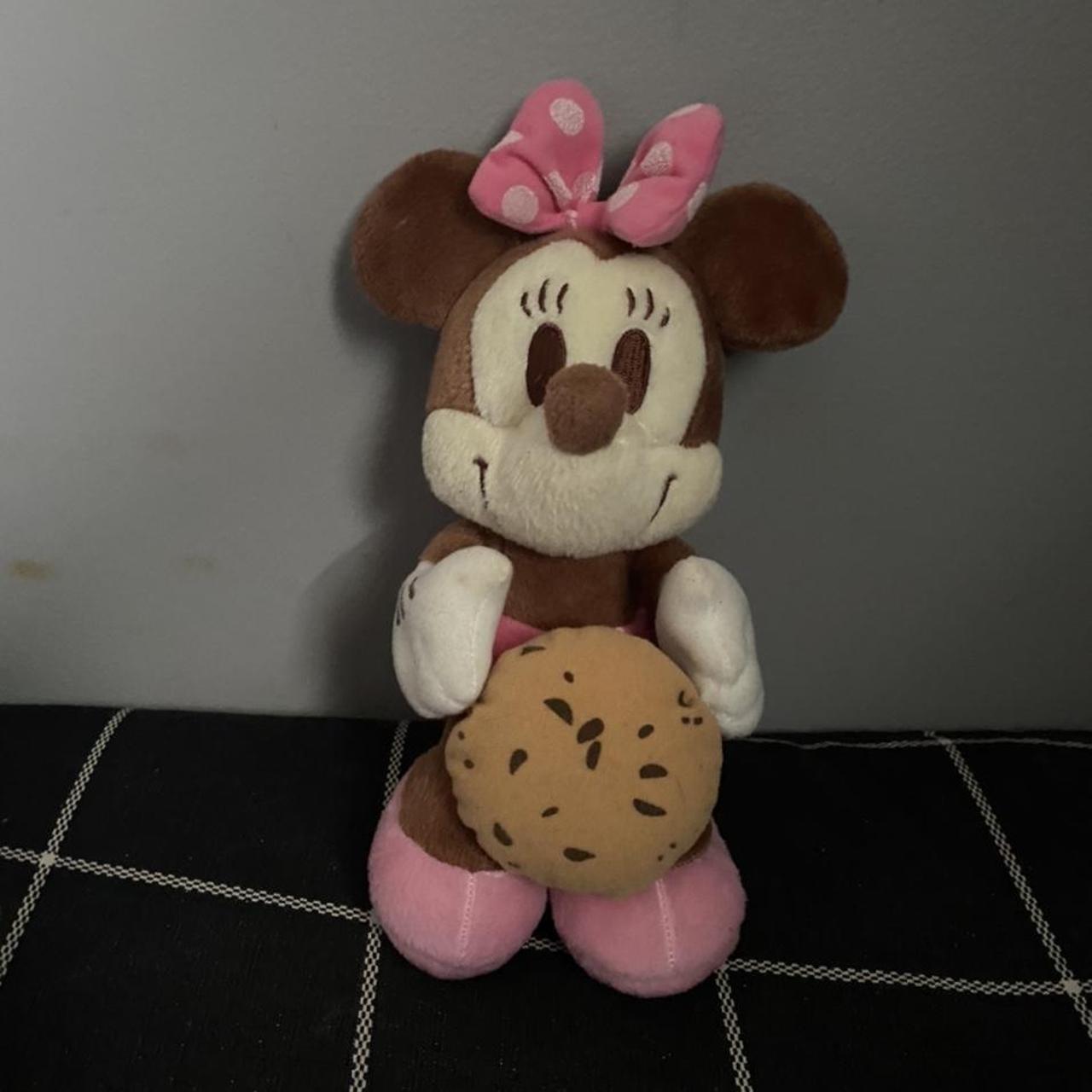 cute small brown Minnie Mouse -holding a cookie... - Depop