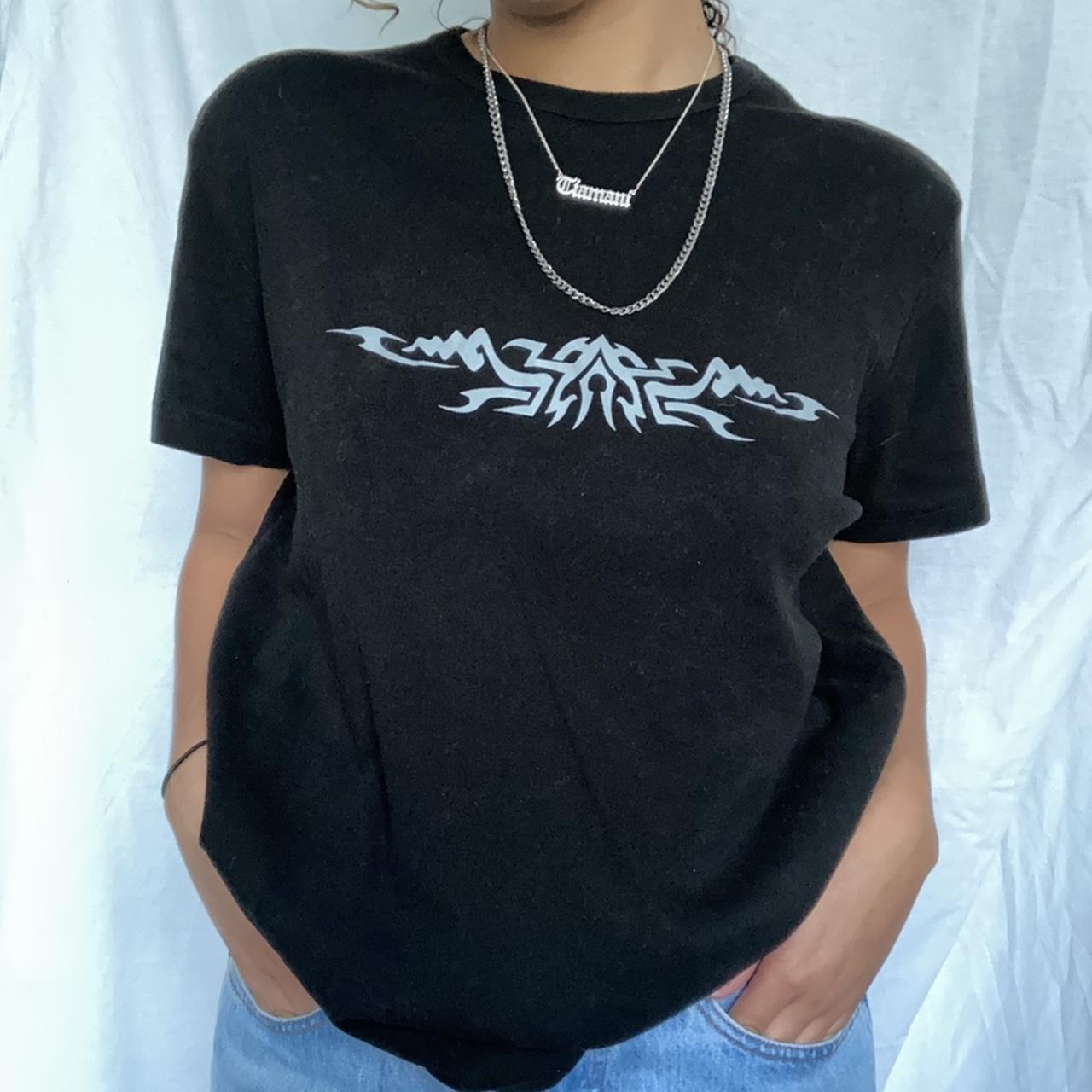 Super sick t shirt with a tribal logo on the front ⭑... - Depop