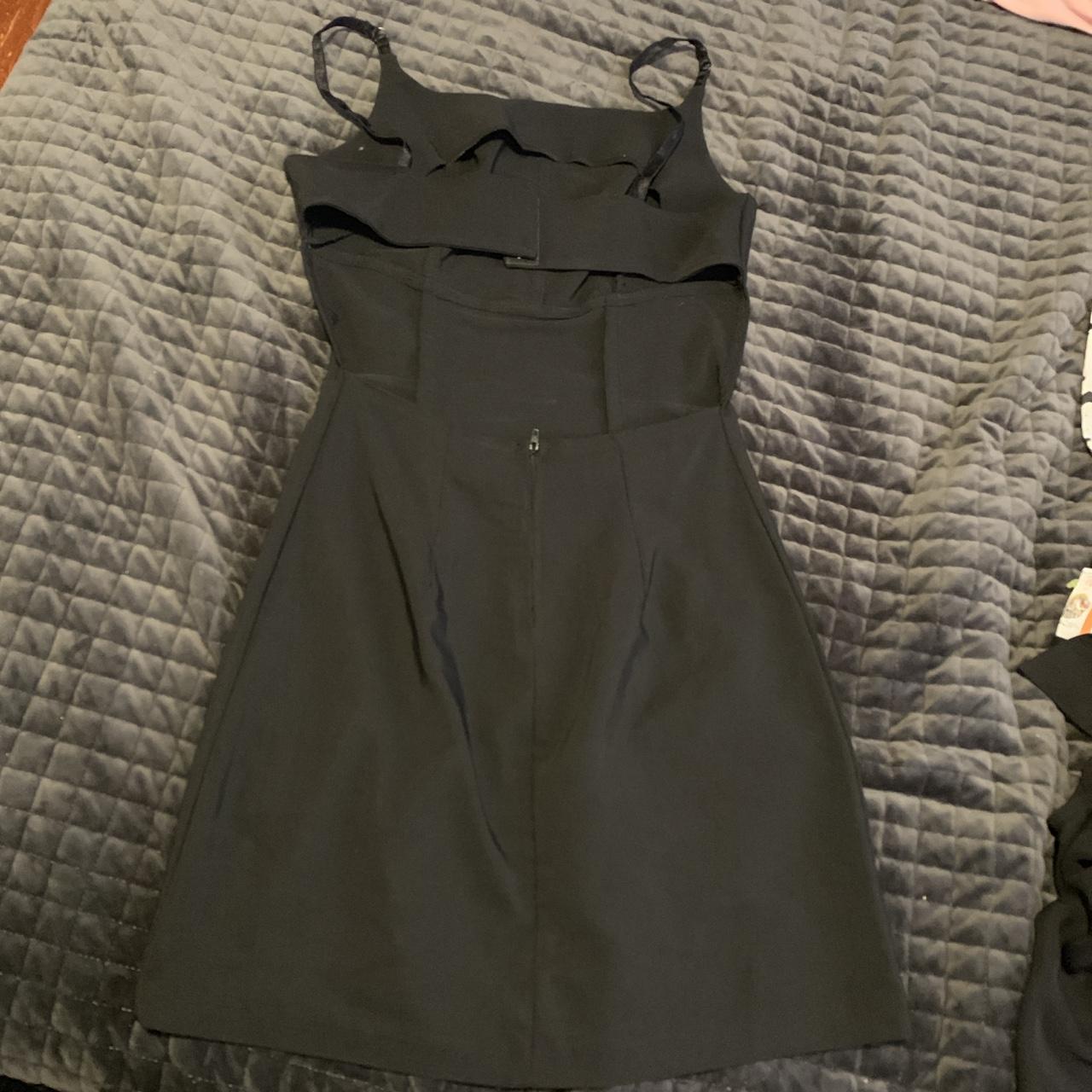 Rocket Candy fitted black dress with open back.... - Depop