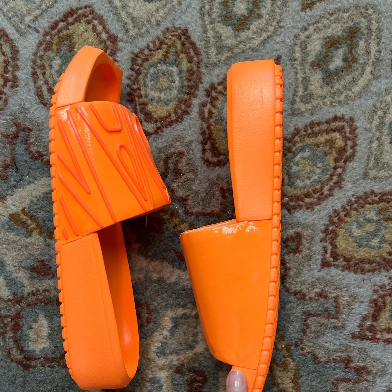 Jordan Women's Orange Slides | Depop