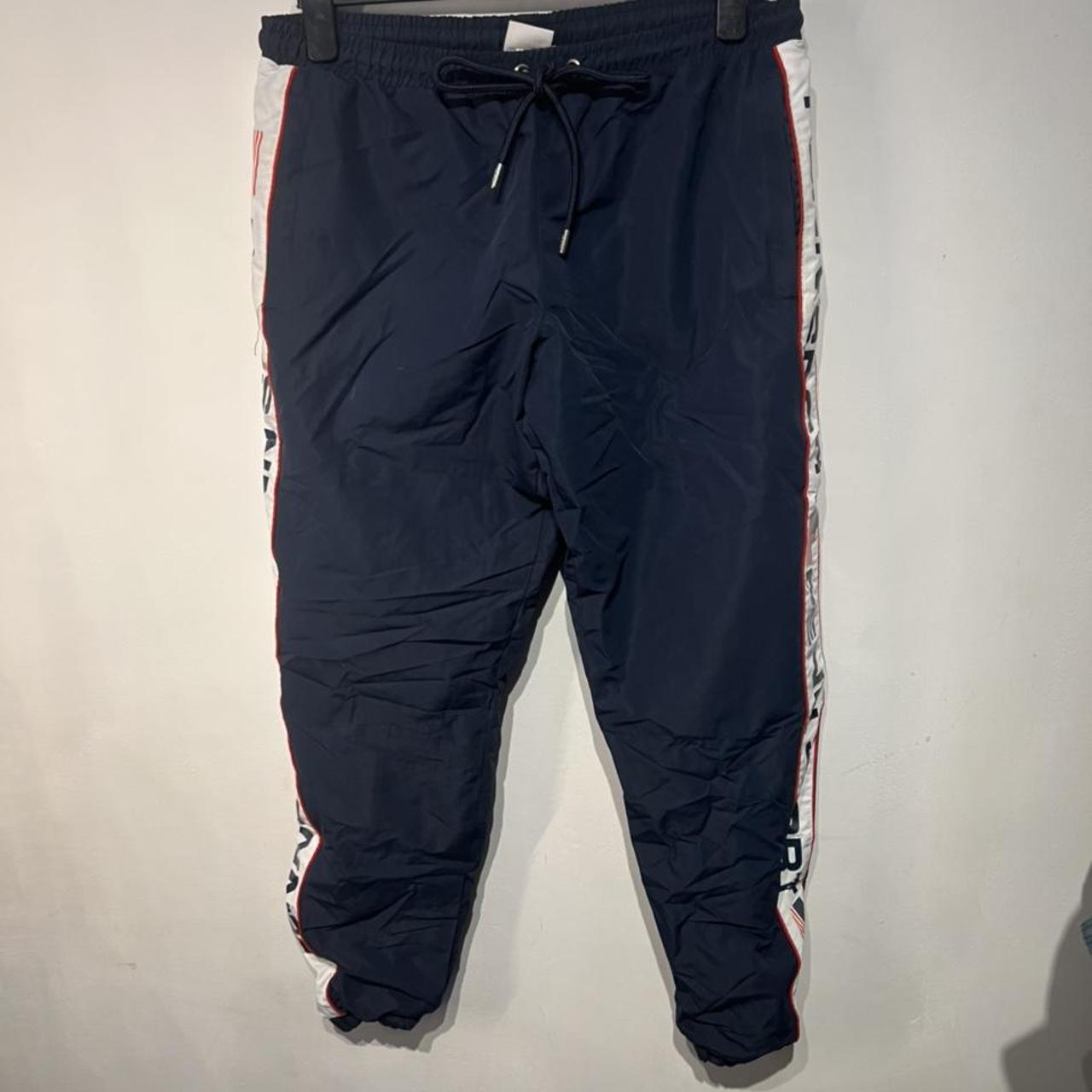 Penn sport blue tracksuit bottoms with design on... - Depop