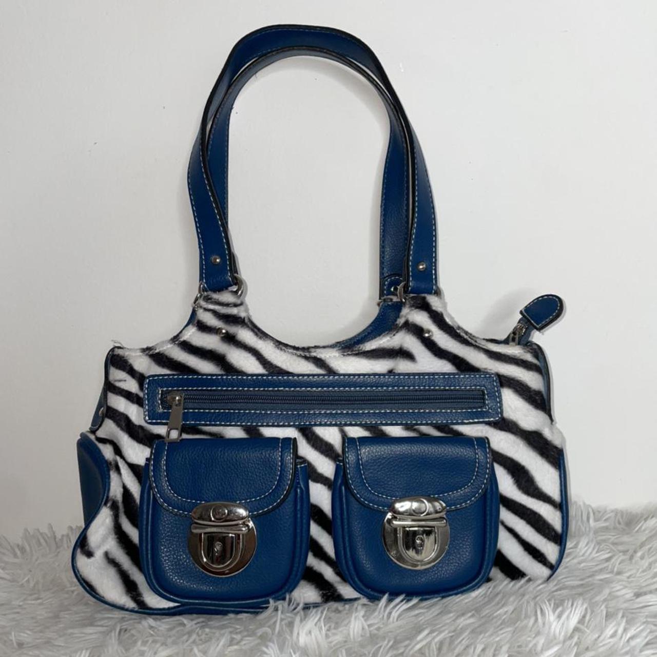 In love with this dark blue and fuzzy zebra print... - Depop