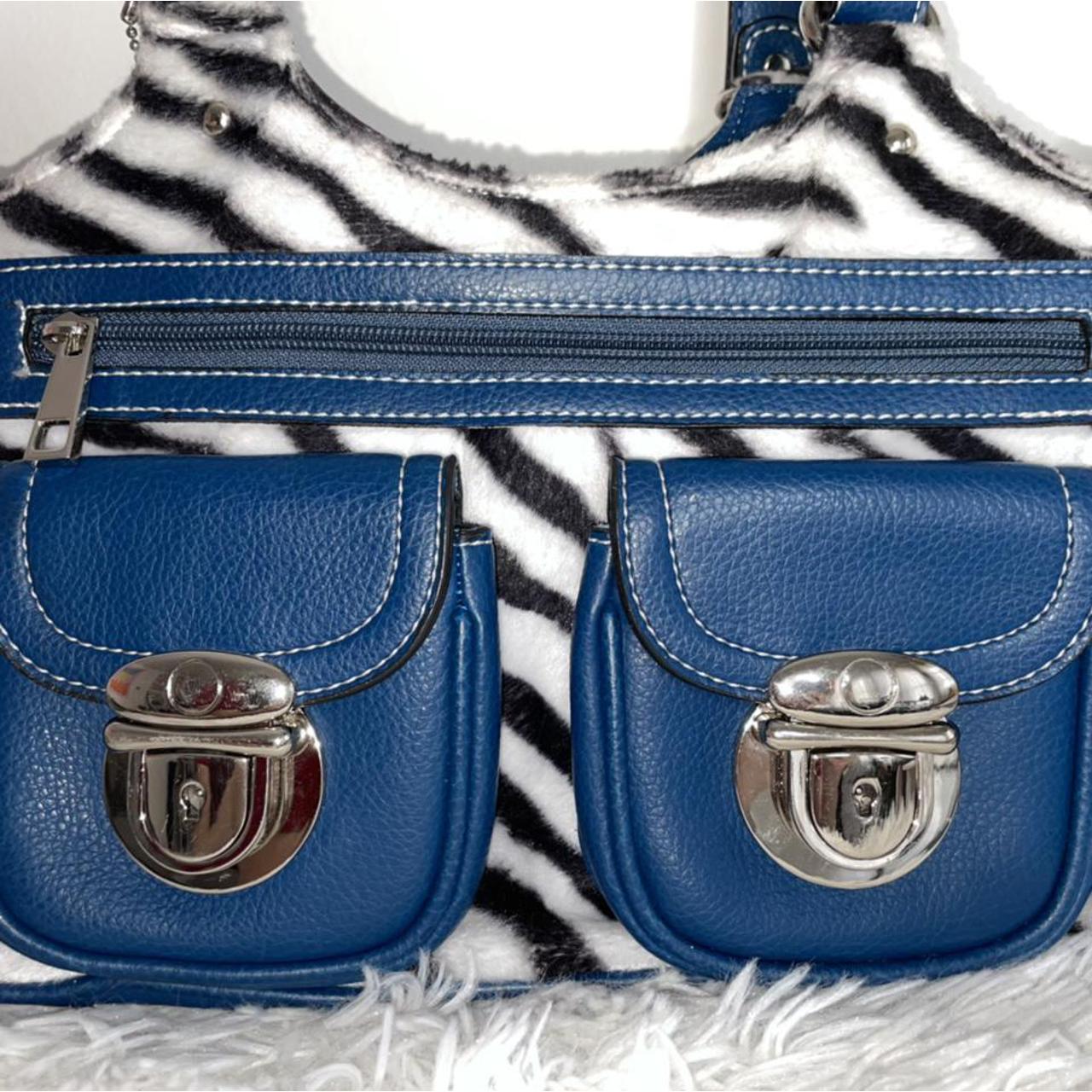 In love with this dark blue and fuzzy zebra print... - Depop