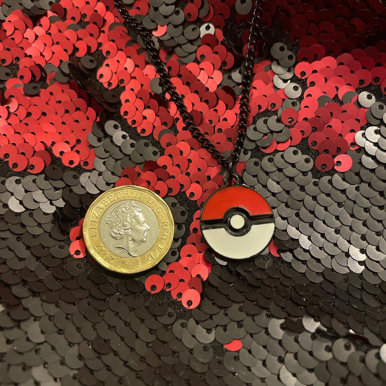Cute metal Pokémon pokeball necklace with black... - Depop