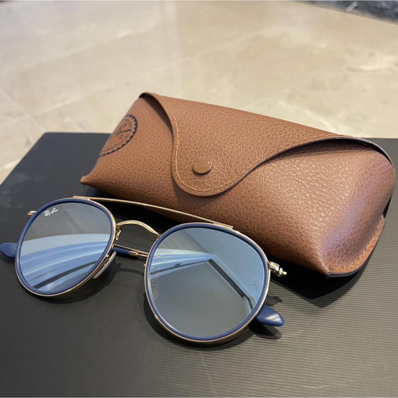 Blue and gold mirrored circle Ray Bans. Worn but it... - Depop