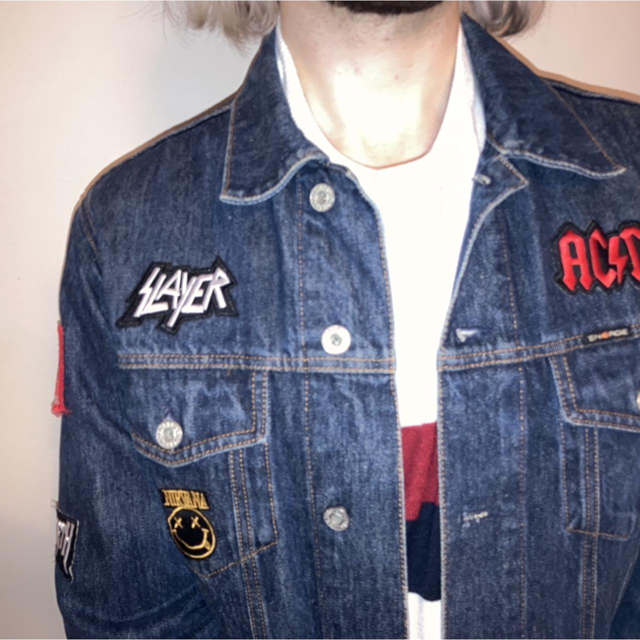 Blue denim jacket with stitched on patches of famous... - Depop