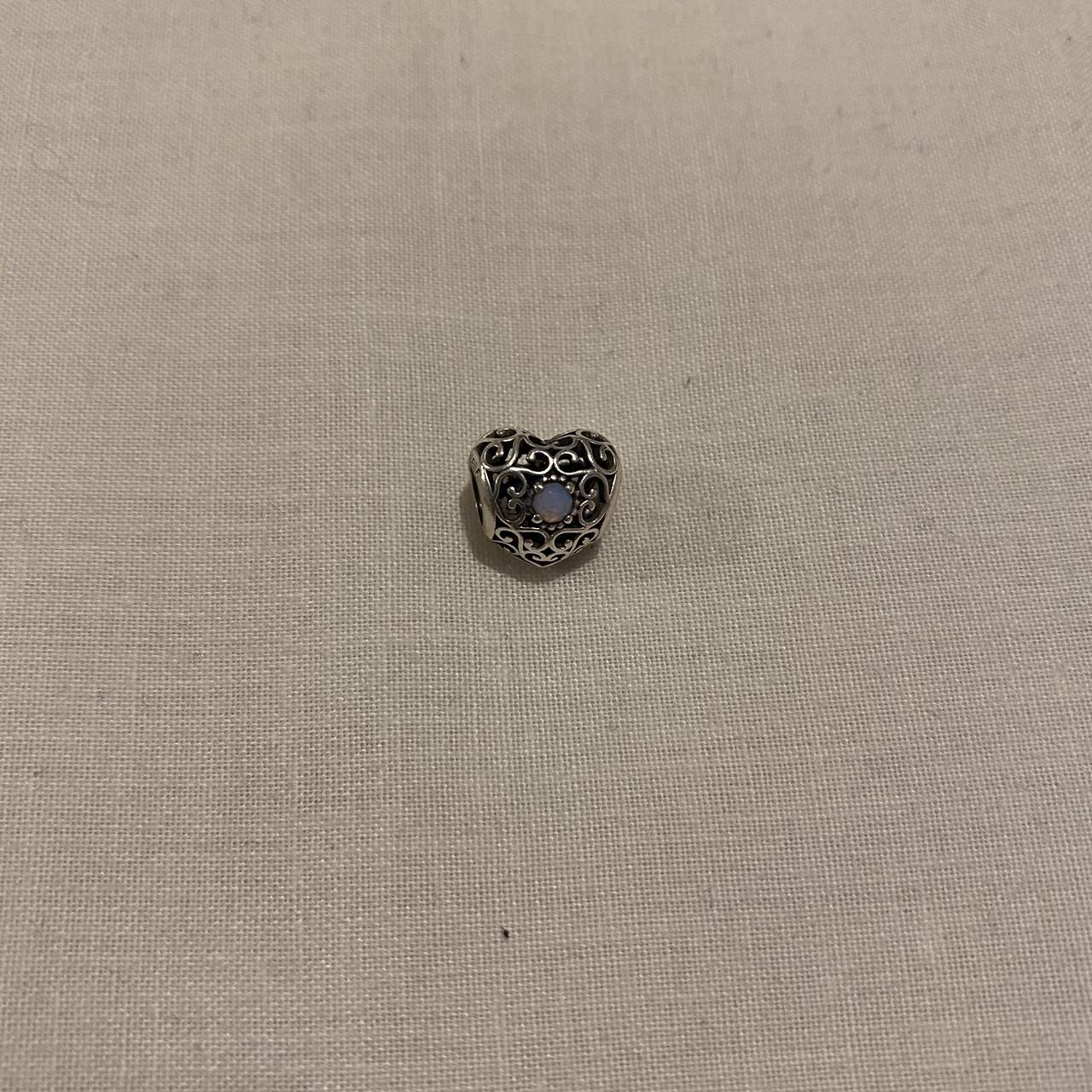 Brand: Pandora Description: October Birthstone Heart... - Depop