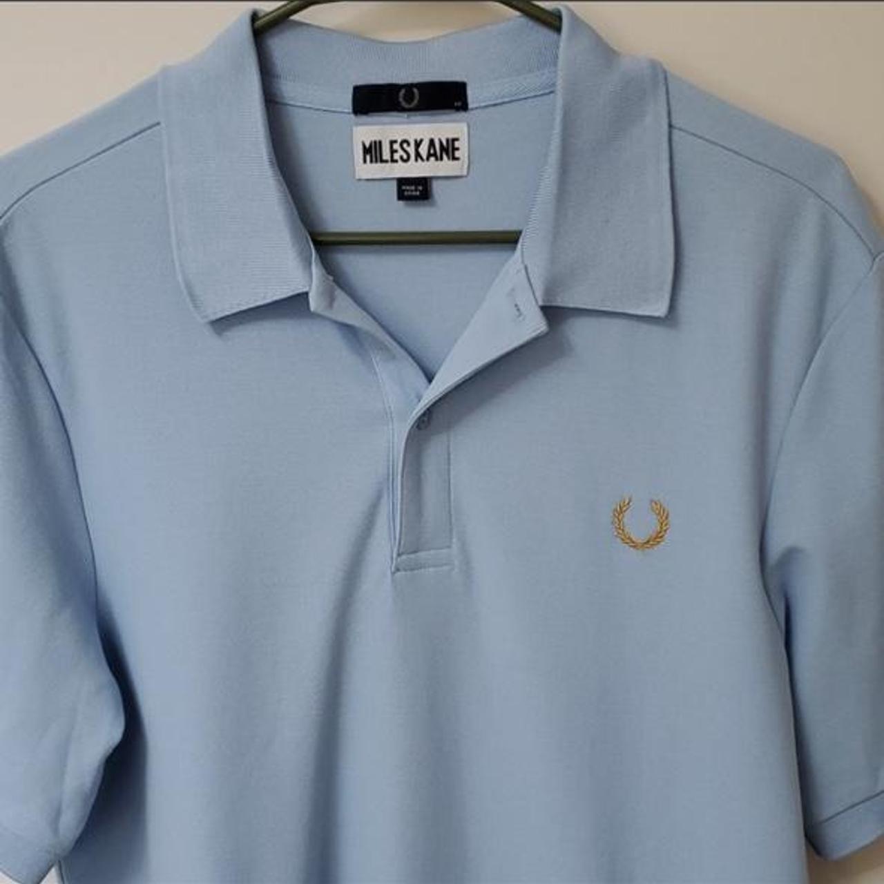Fred Perry Miles Kane baby blue polo with gold... - Depop