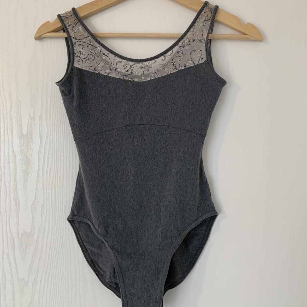 Grey leotard with beautiful mesh detail across the... - Depop