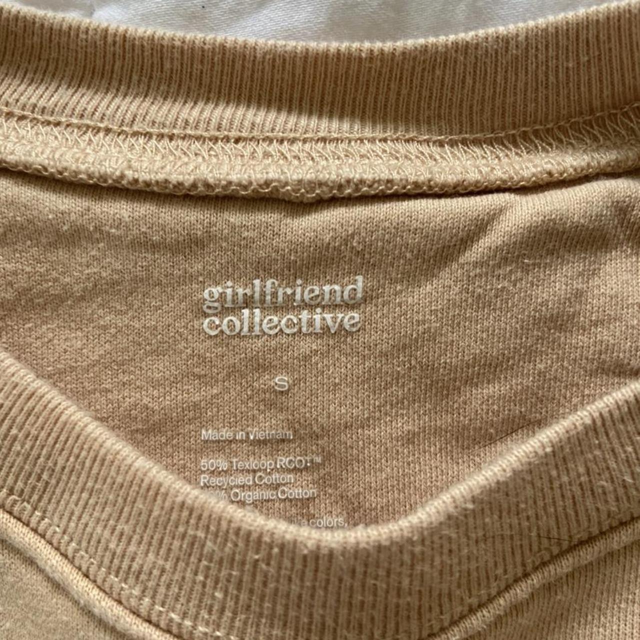 Peach colored girlfriend collective pullover in size... - Depop