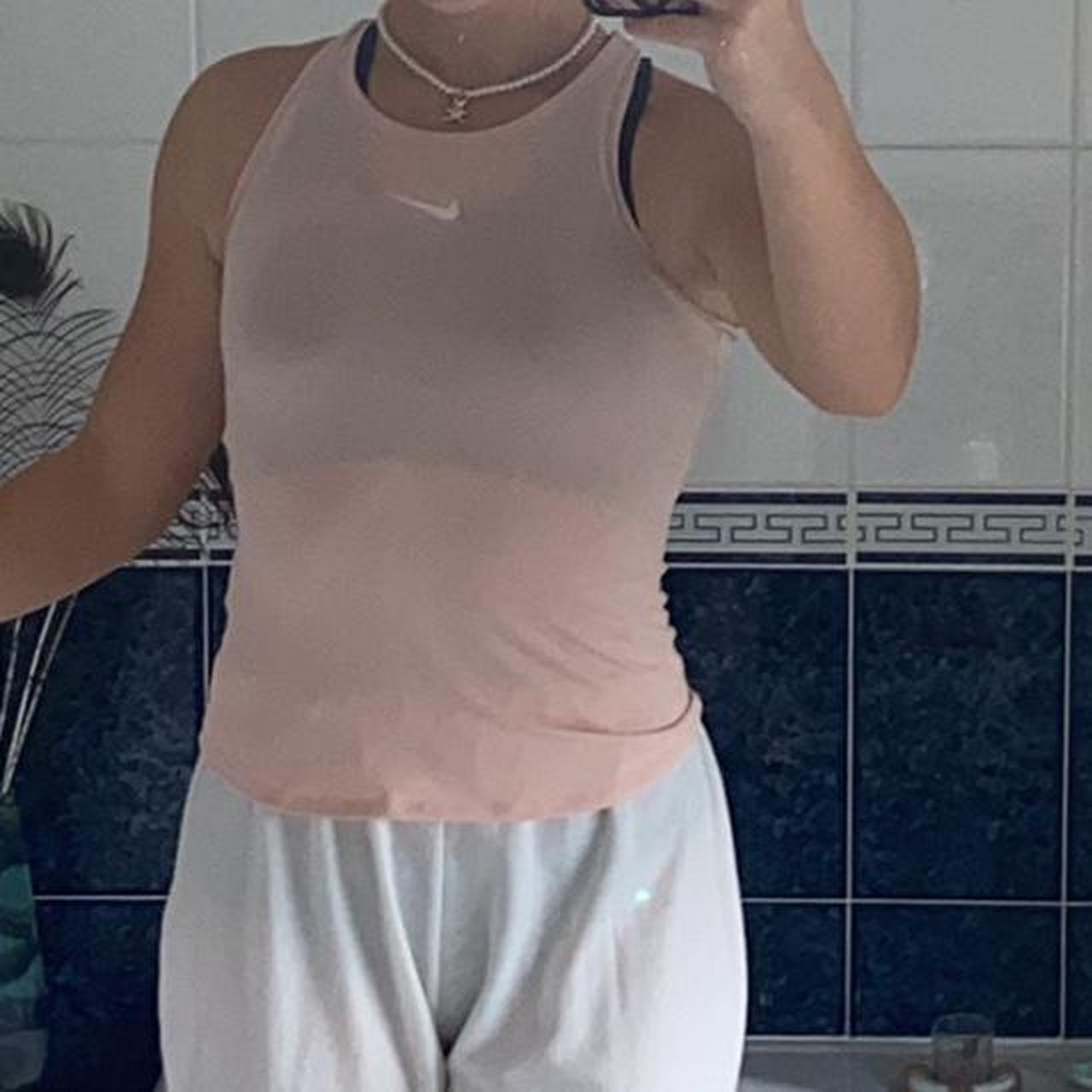 Pink Nike training top Girls xs Selling as too... - Depop
