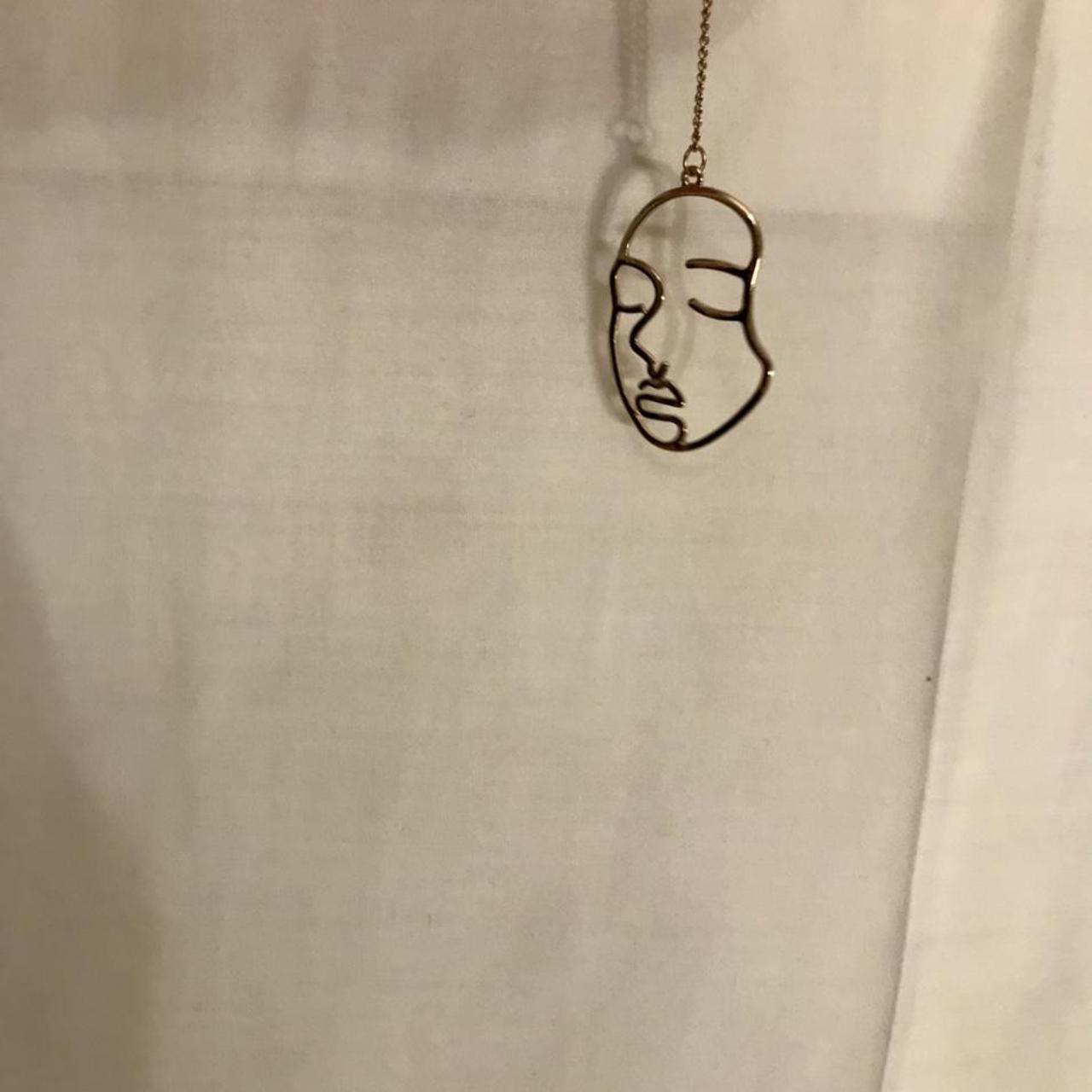 Cool gold colour dangly face earrings. Great... - Depop