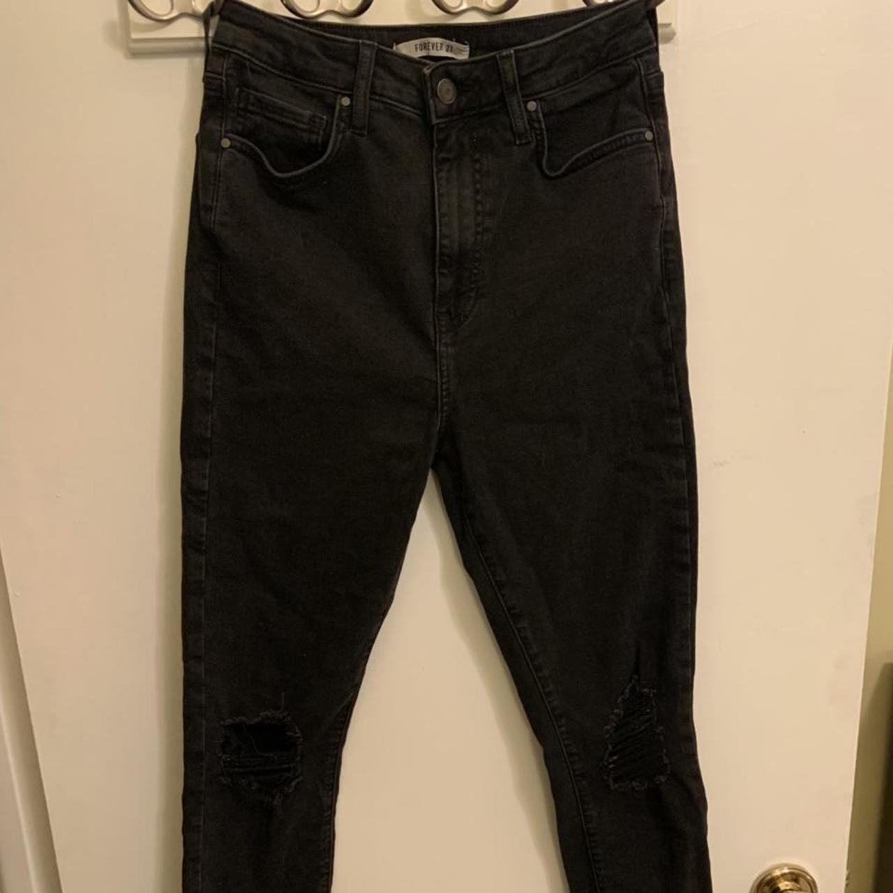 -black skinny jeans with rips in the knees -worn a... - Depop