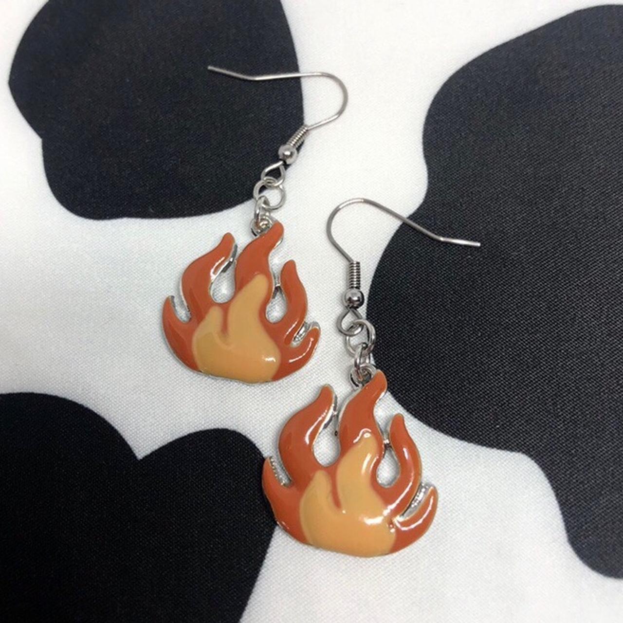 Super cute two tone flame earrings, handmade by me... - Depop