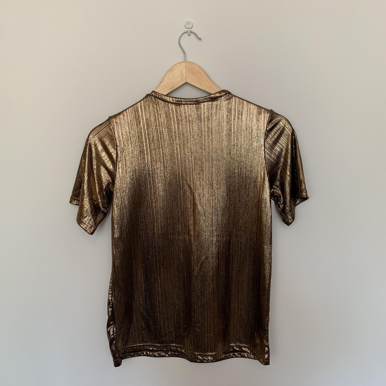 Gold Shiny Short-sleeved Top with Cut-out at... - Depop