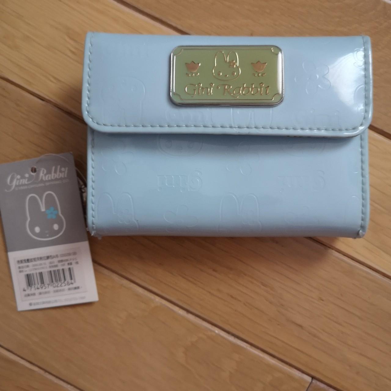 Gini Rabbit PVC baby blue wallet It's embossed with... - Depop