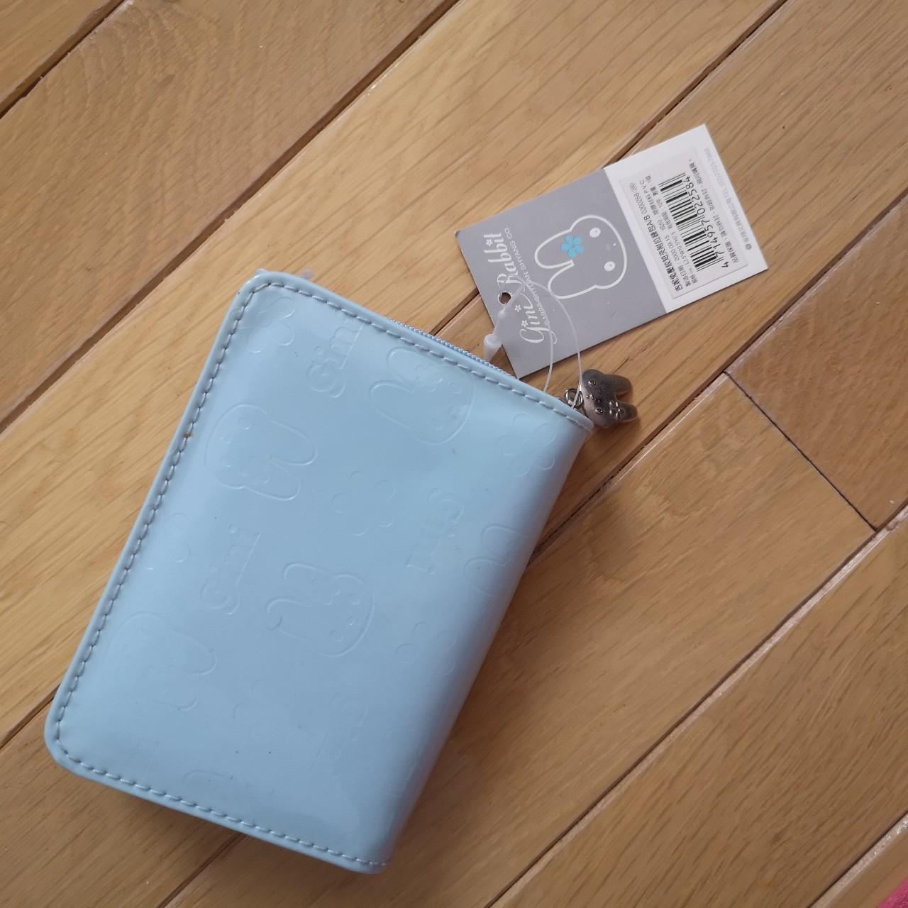 Gini Rabbit PVC baby blue wallet It's embossed with... - Depop