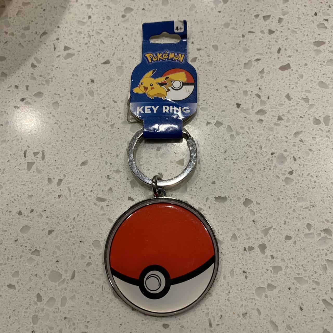 Pokémon Pokeball Metal Keychain *has some minor... - Depop