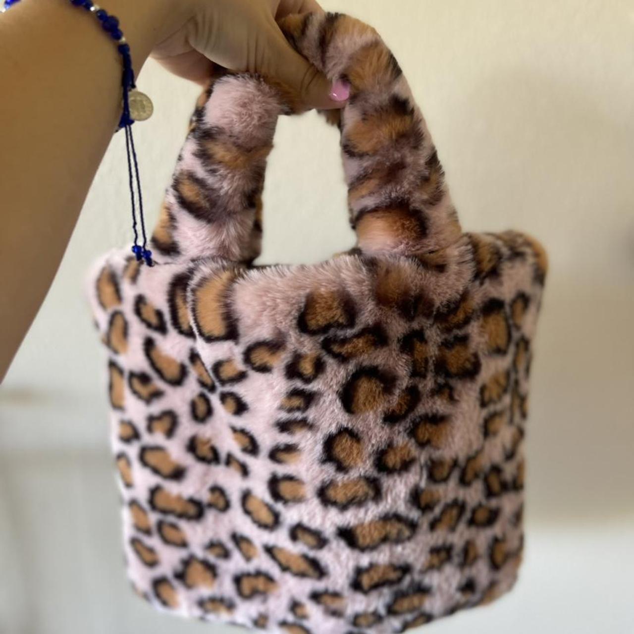 the cutest pink fluffy purse with leather interior... - Depop