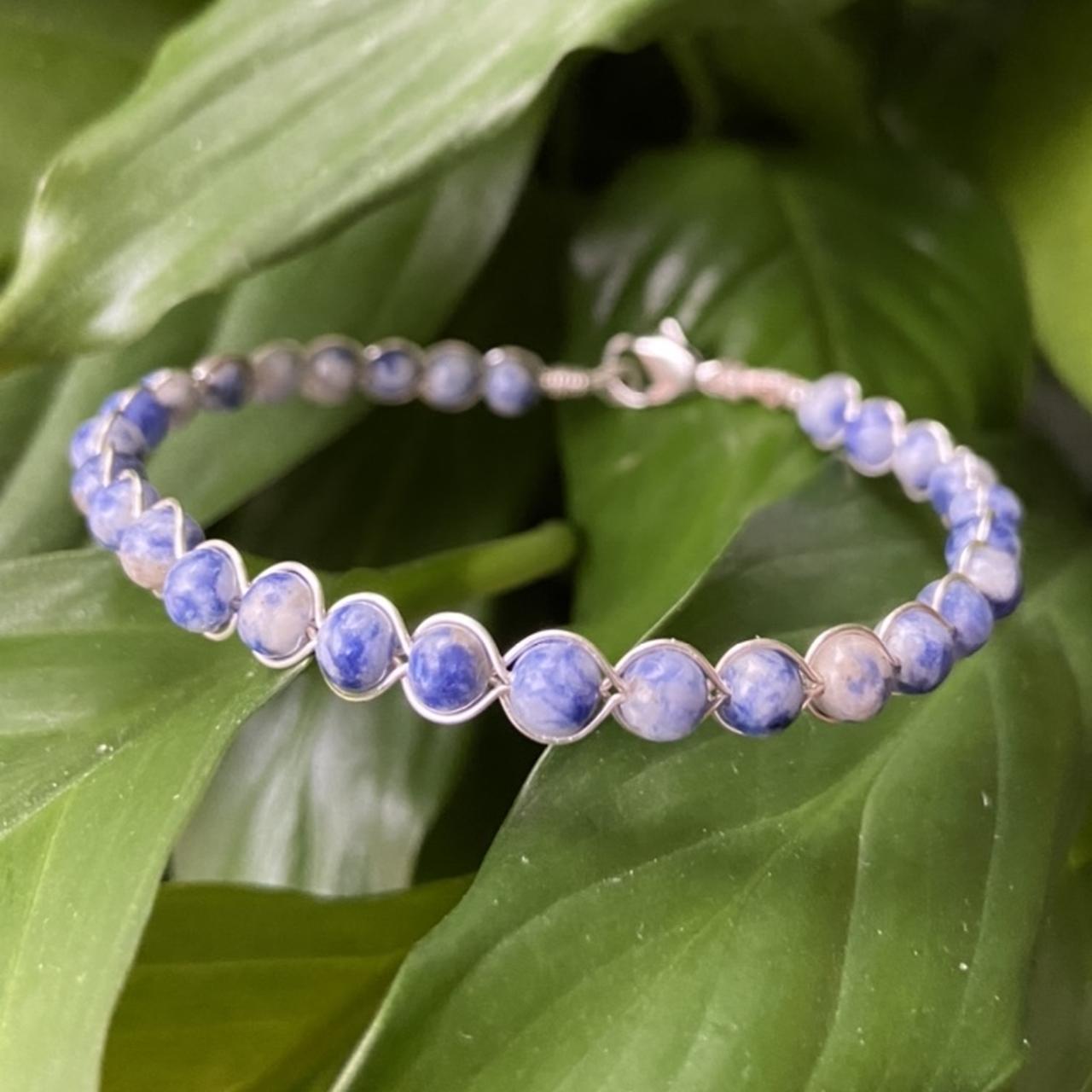 Handmade beaded wire braided bracelet with... - Depop