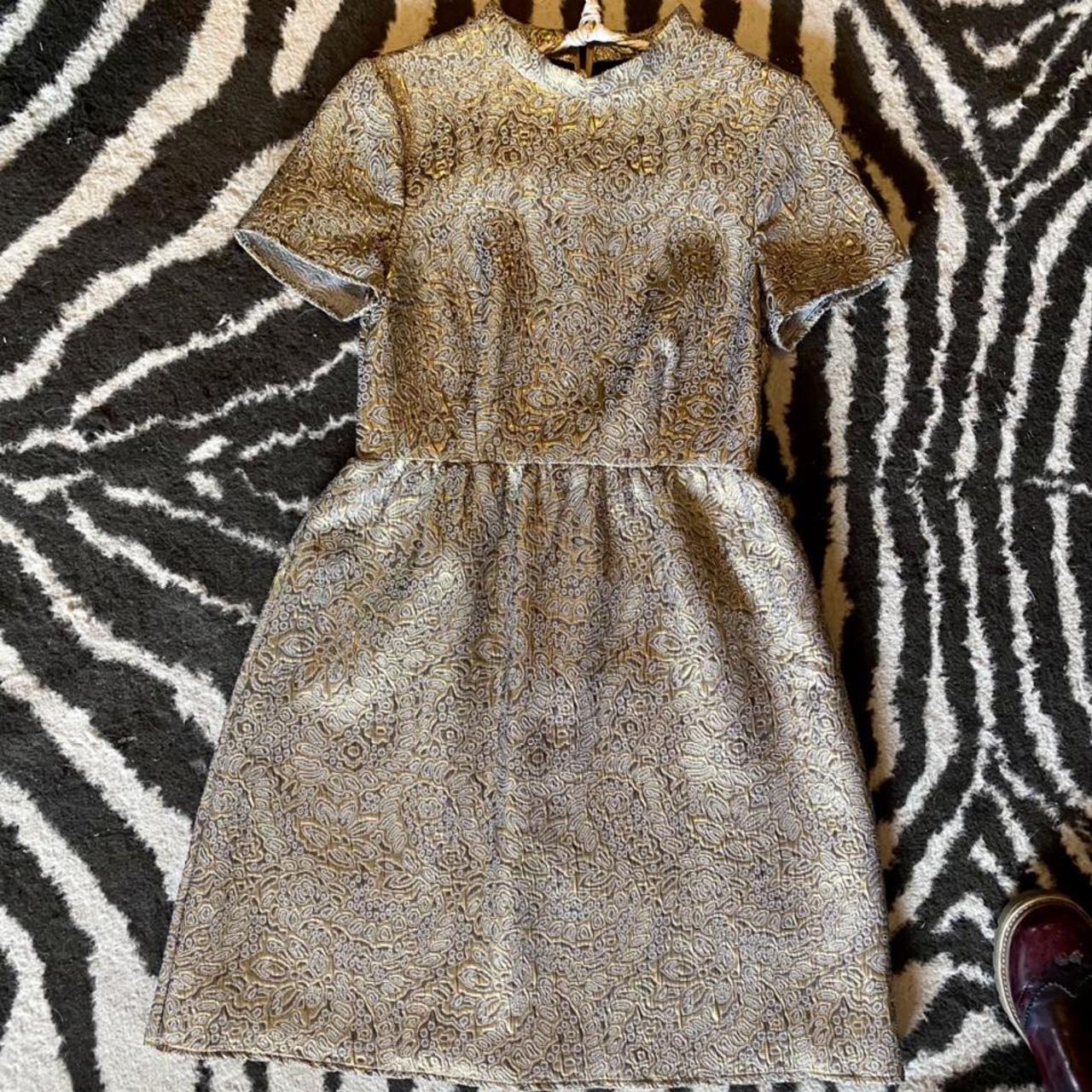 Beautiful golden dress with embossed pattern,... - Depop