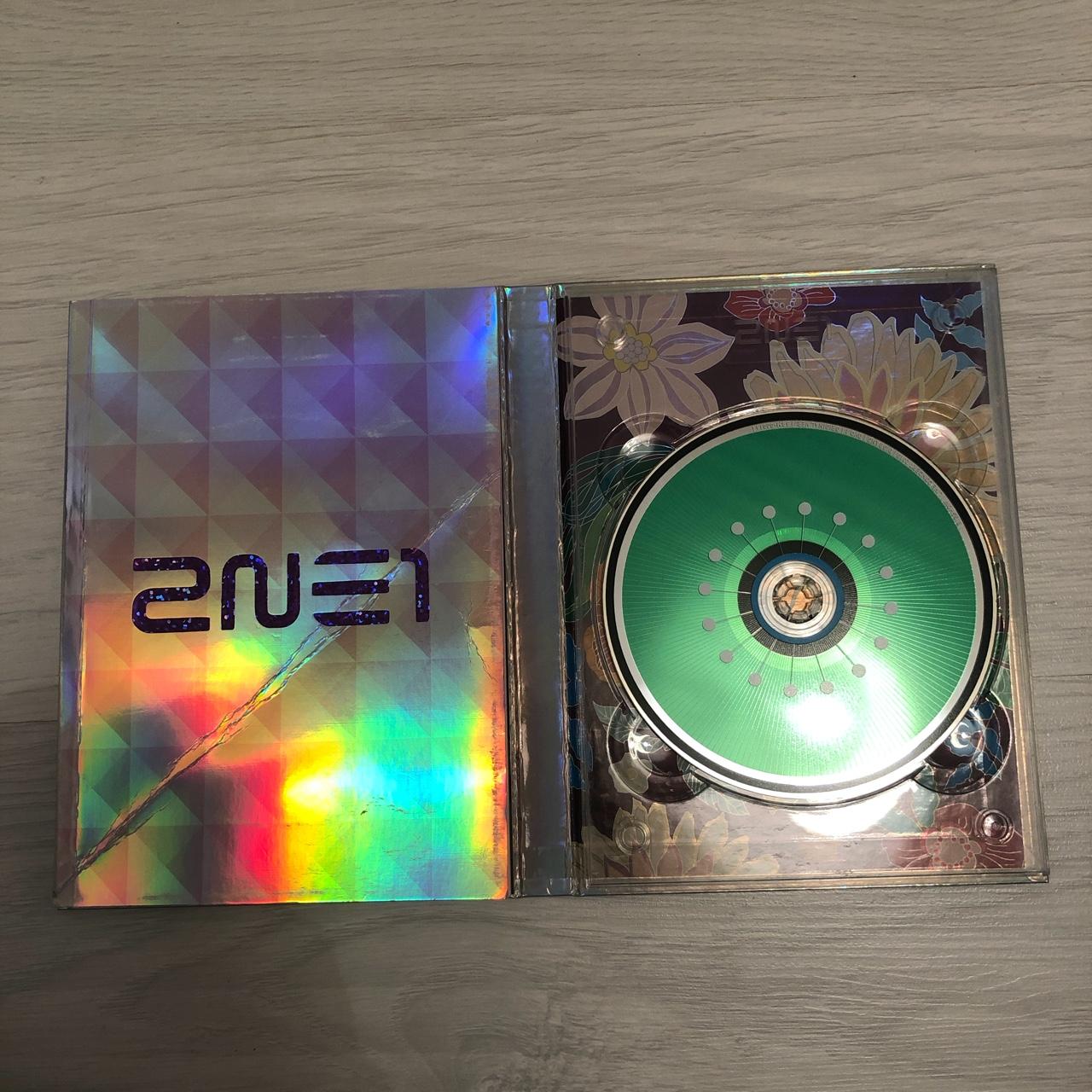 2ne1 the first album to anyone signed by all... - Depop