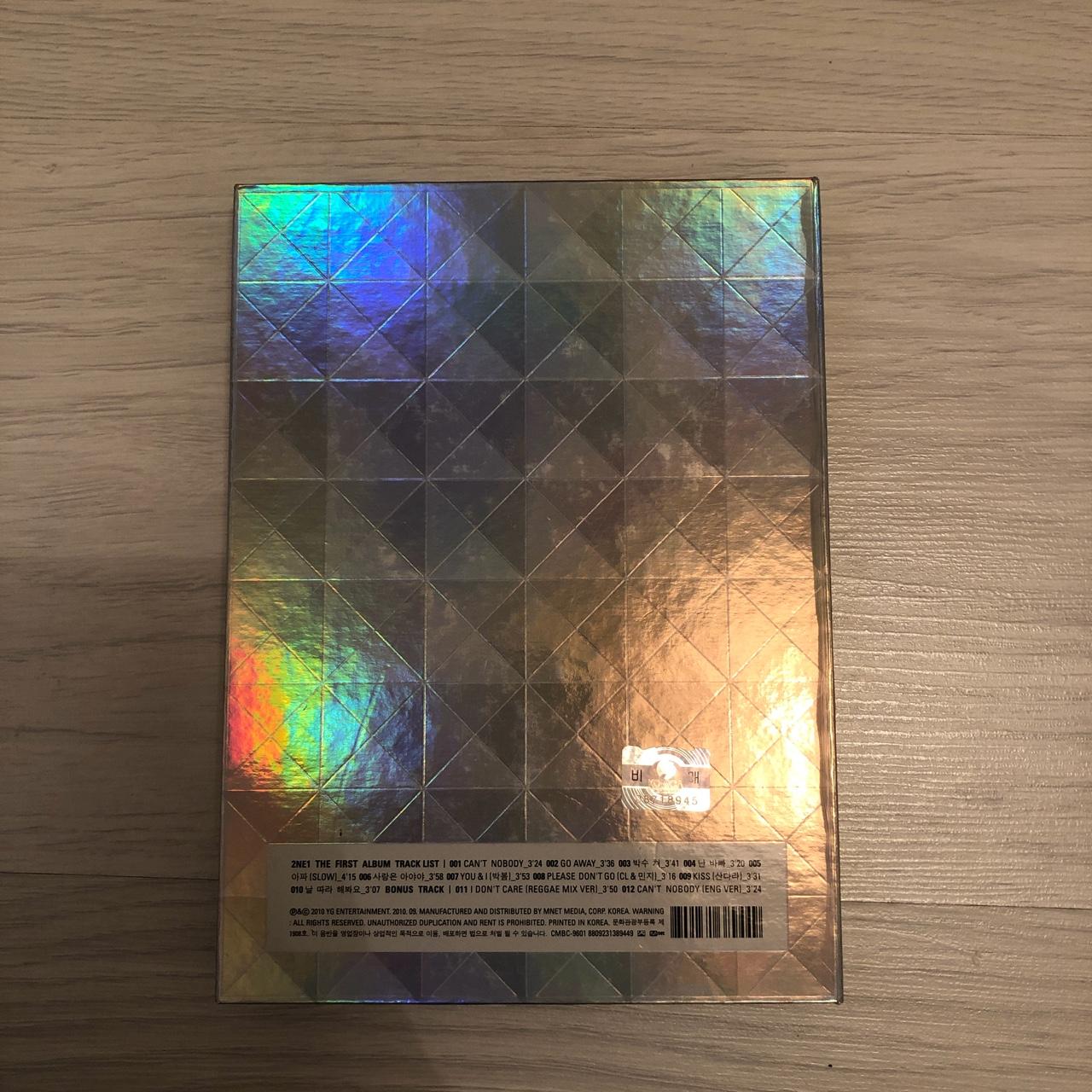 2ne1 the first album to anyone signed by all... - Depop