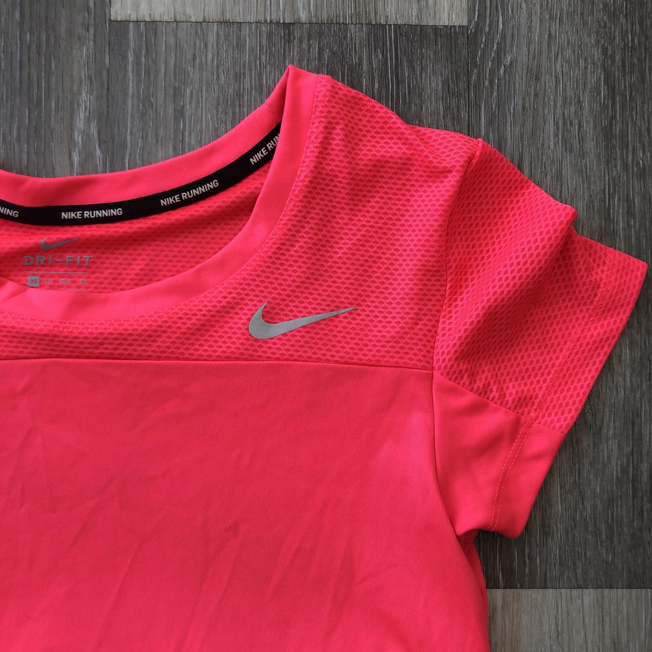 Nike neon pink dri-fit T-shirt. Size XS will fit... - Depop