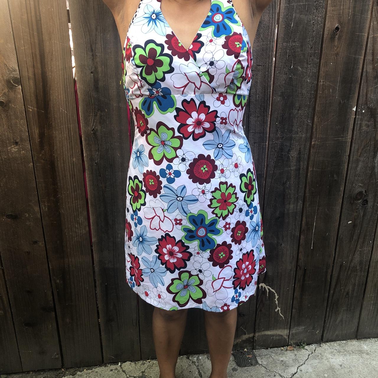 A cute strip dress dress on one side and on the... - Depop