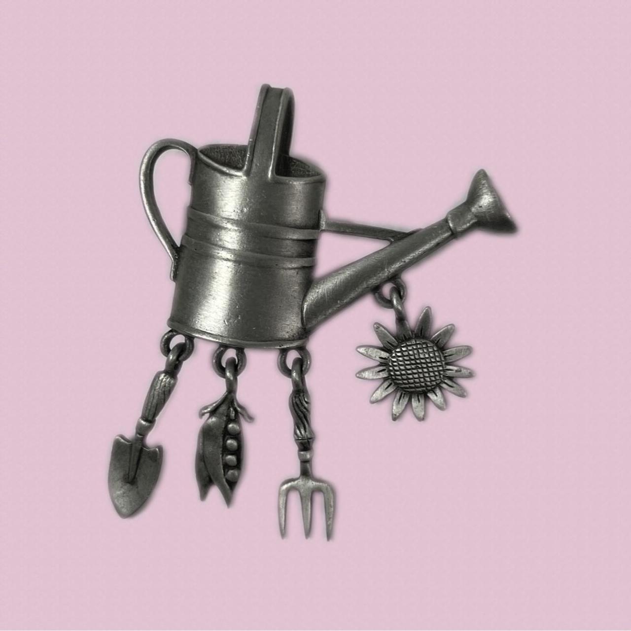 Vintage silver watering can shaped brooch with cute... - Depop