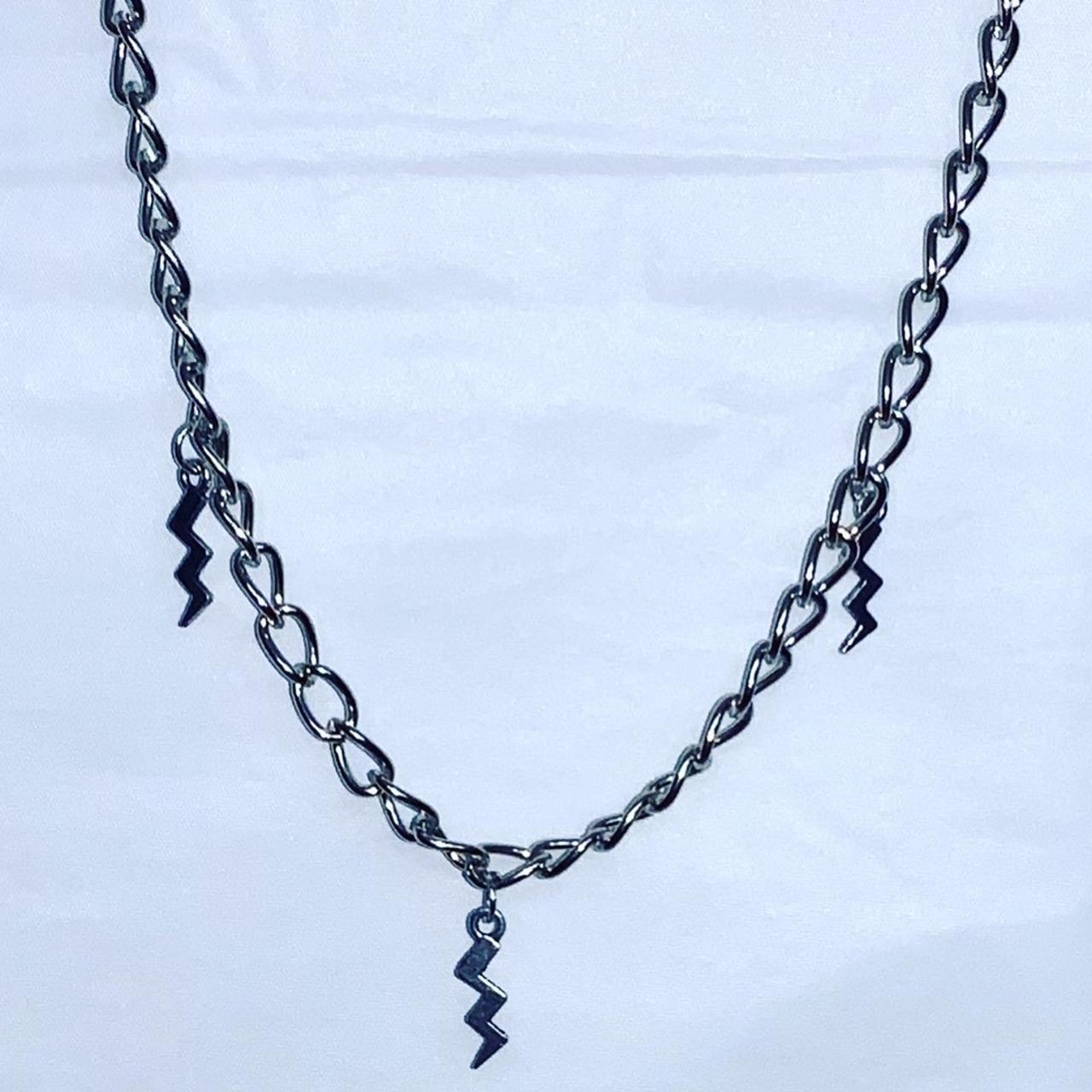 the lightning bolt chain necklace by electric by... - Depop