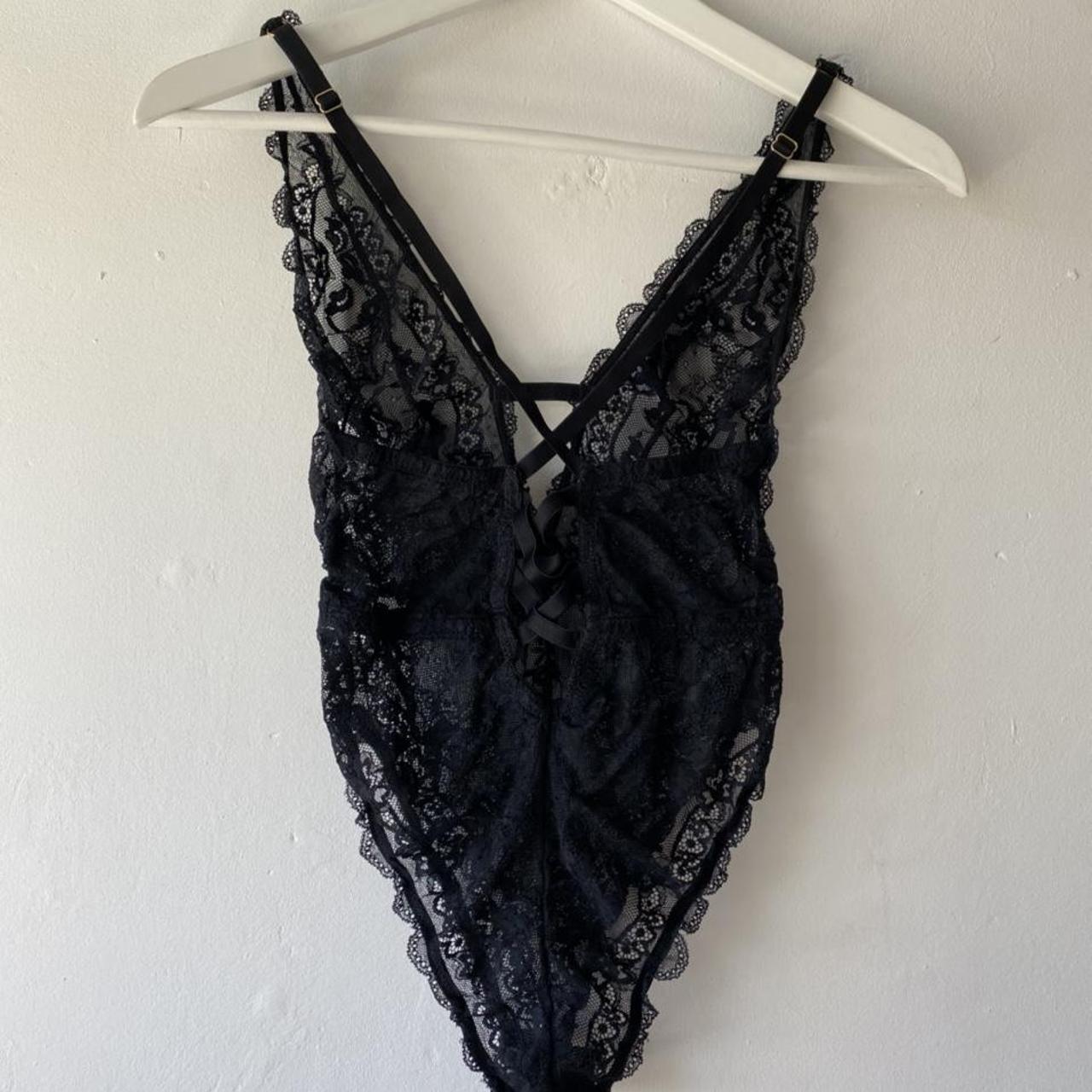 Beautiful black lace body with elasticated cross... - Depop