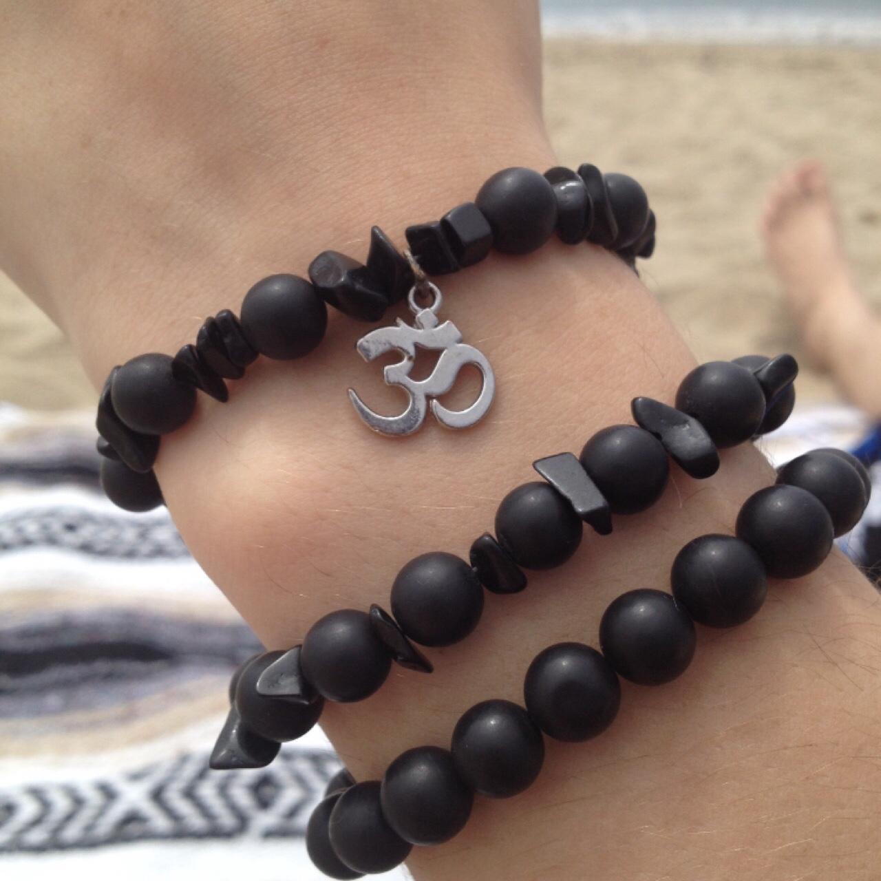 black obsidian stretch bracelets with ohm charm ... - Depop