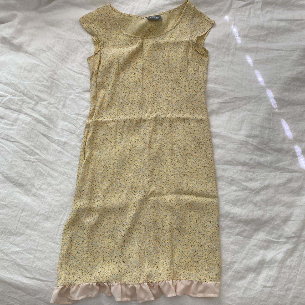 beautiful floral dress. Inseams seem to be weak from... - Depop