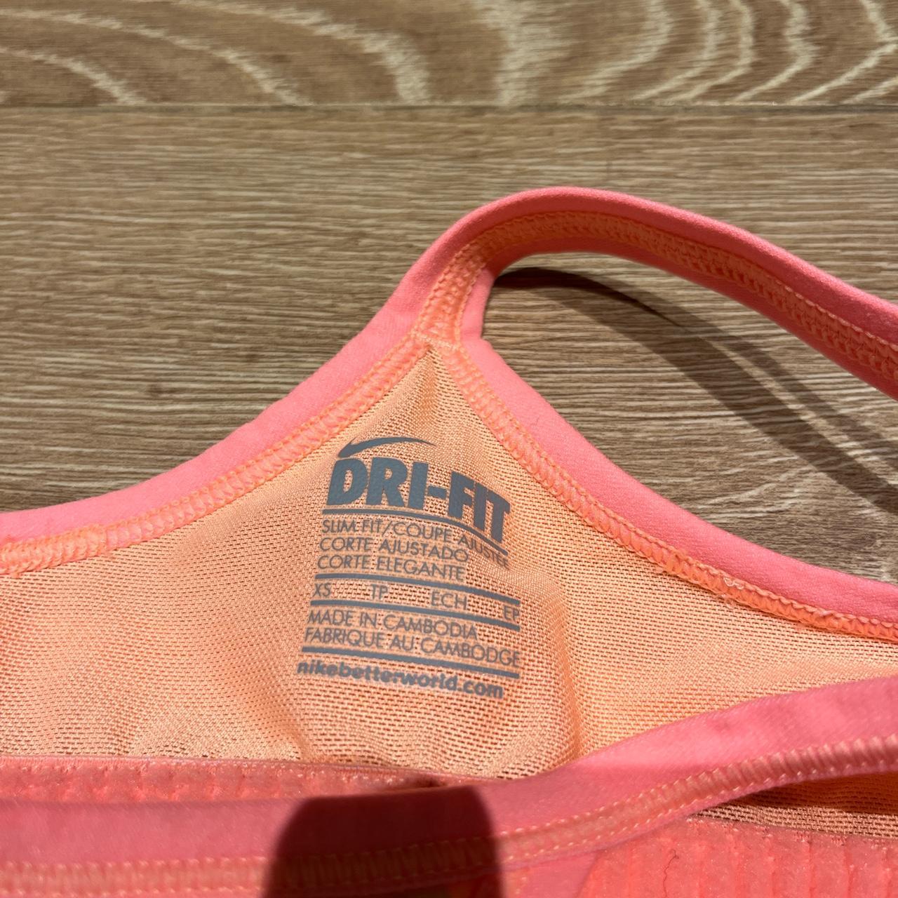 Nike Dri-fit padded work out top in peach and grey... - Depop