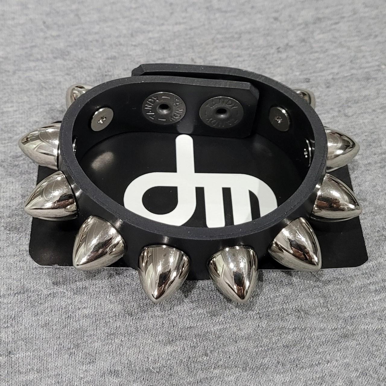 Spiked neoprene cuff Built with solid 1/8" thick... - Depop