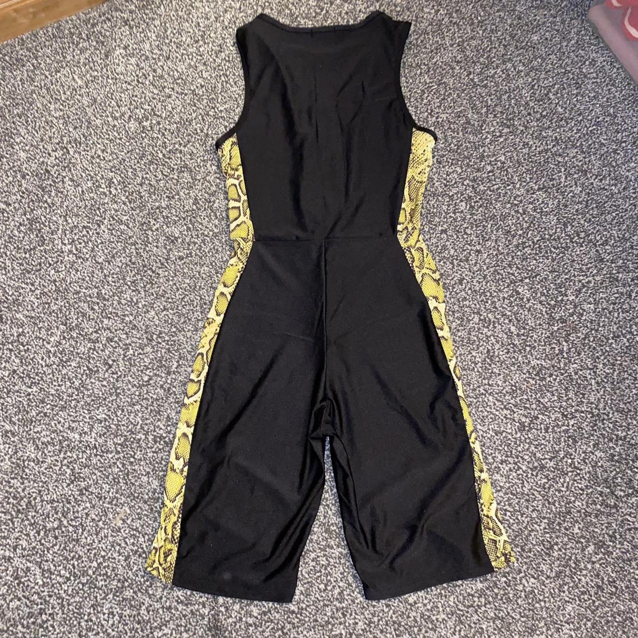 Black unitard with snake print panels - great... - Depop