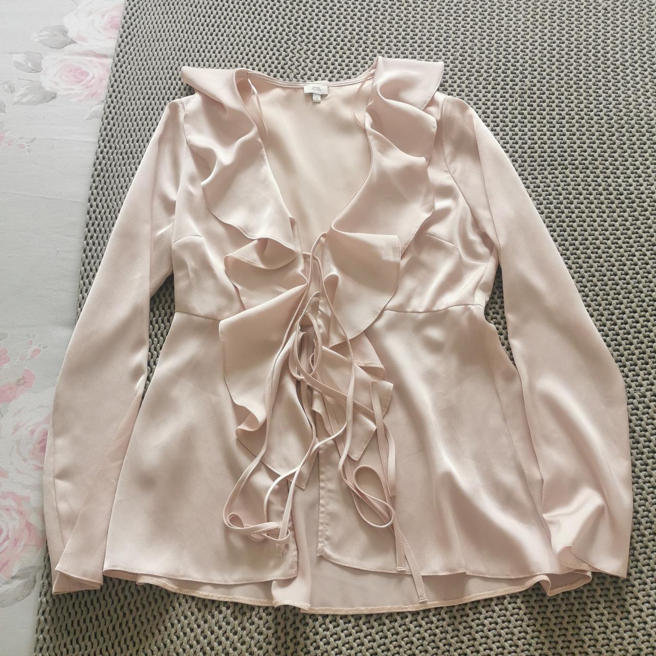 Light pink satin blouse Tie at the front POSTAGE... - Depop