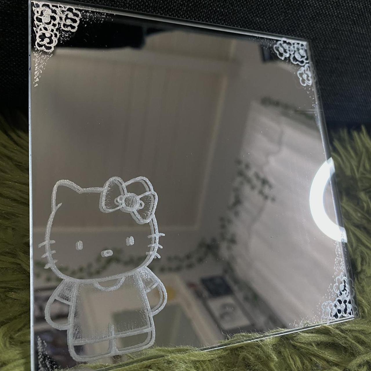 Hello kitty engraved mirror with little flower... - Depop