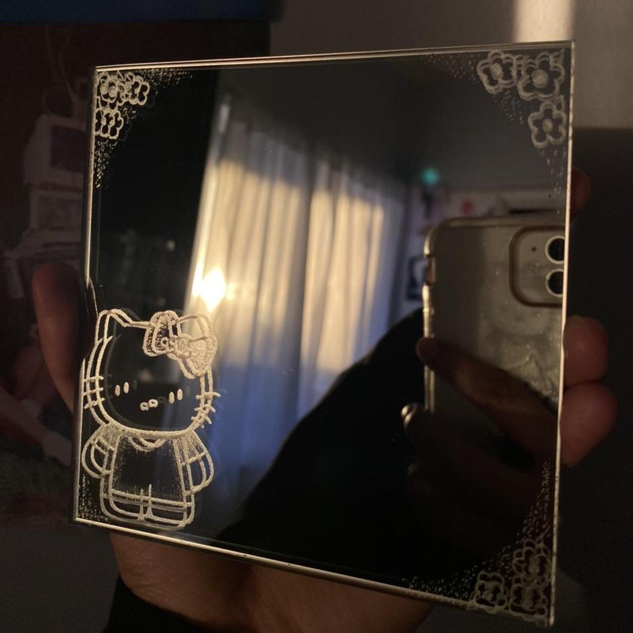 Hello kitty engraved mirror with little flower... - Depop