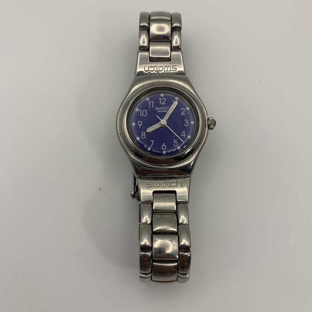 Ladies Genuine Swatch watch blue face silver tone... - Depop