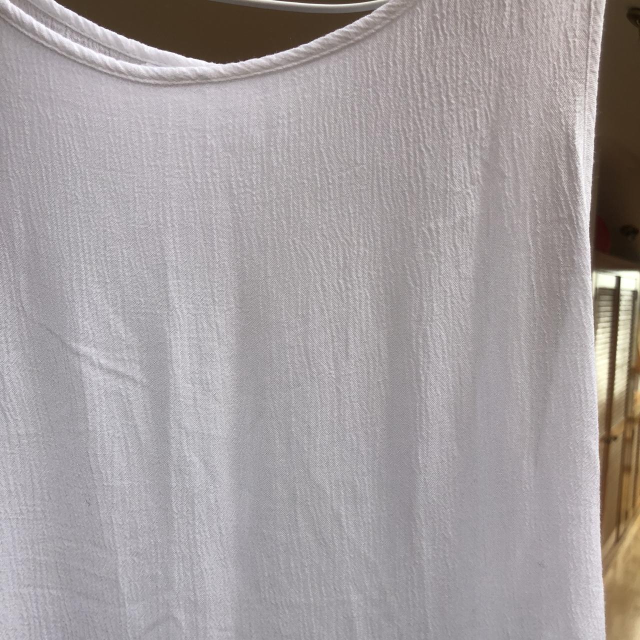 White sleeveless drop hem top. Sample from house of... - Depop