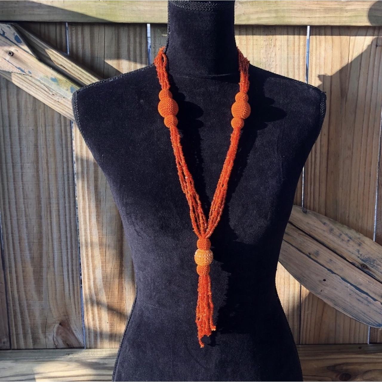 Orange Tassel Necklace Made Up of Multiple Strands... - Depop
