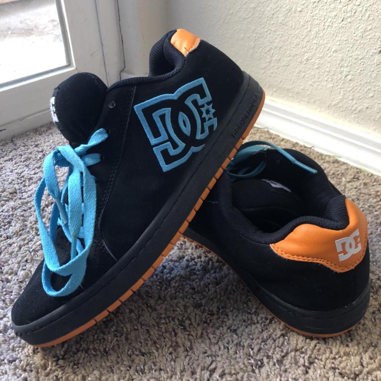 black DC shoes with teal and orange accents - Depop